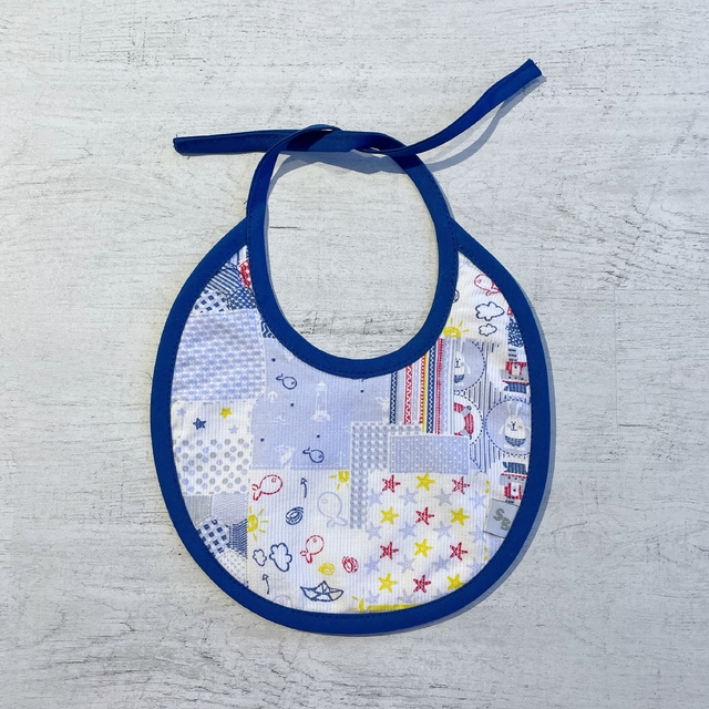 Babero con tira azul - Comprar en Saque Buraque