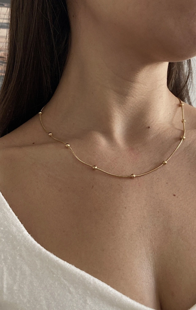 Colita de raton con bolitas dorada - Arya complementos