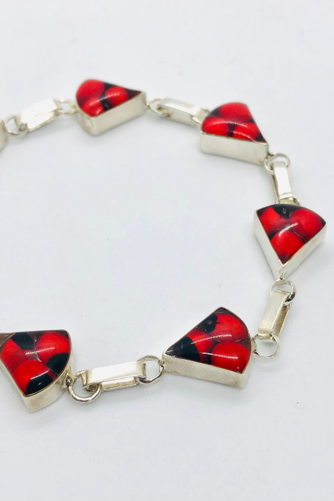 PULSERA TRIANGULOS HUAYRURO