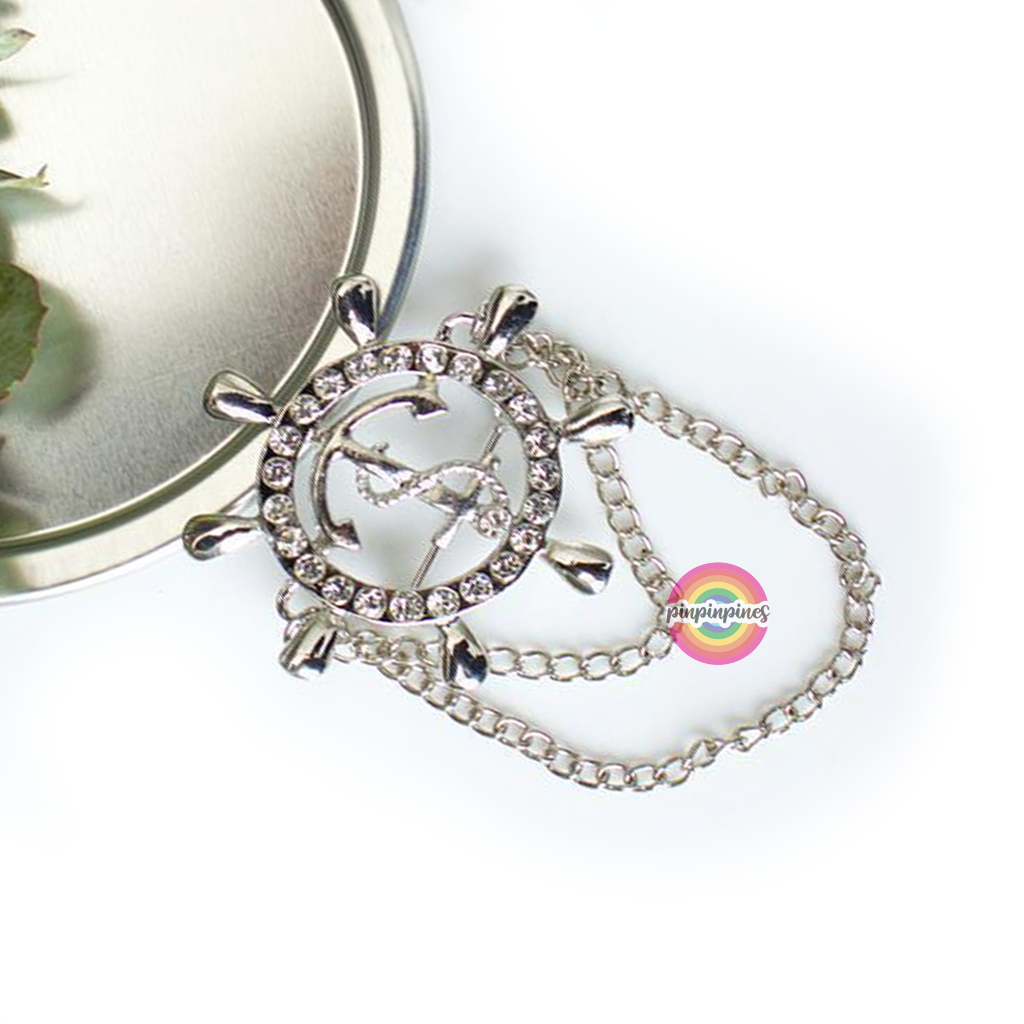 Broche con cadena, precio
