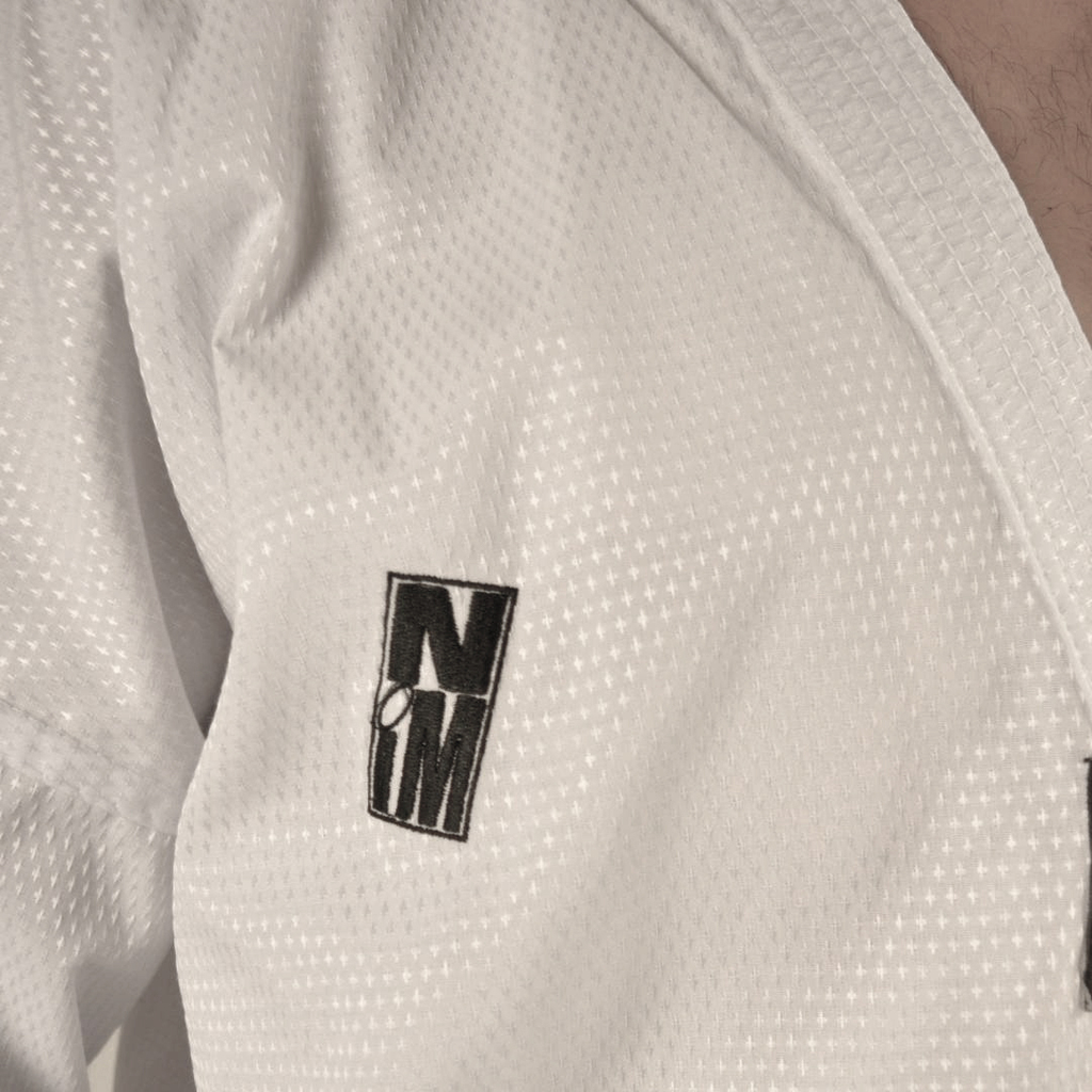 Dobok Taekwondo Olympic - Comprar em Kimonos Nim