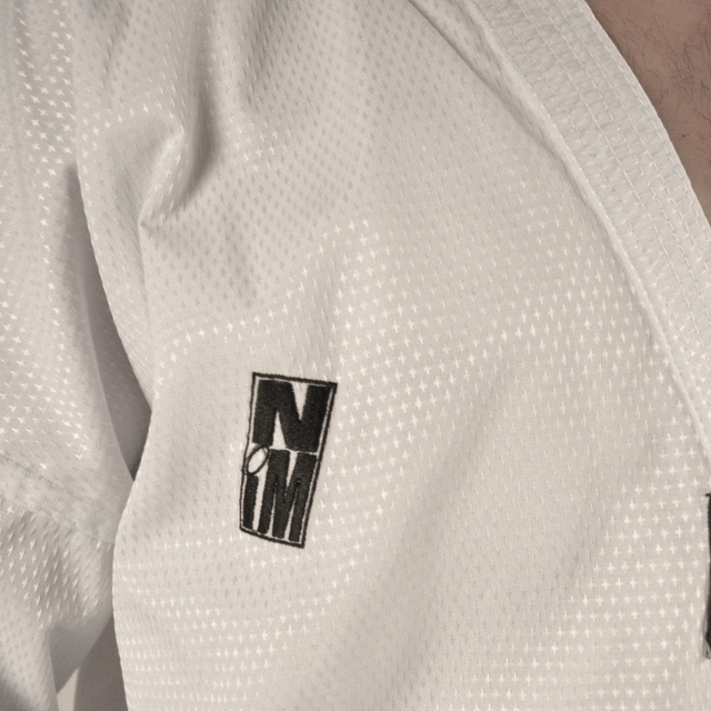 Dobok Taekwondo Olympic - Comprar em Kimonos Nim