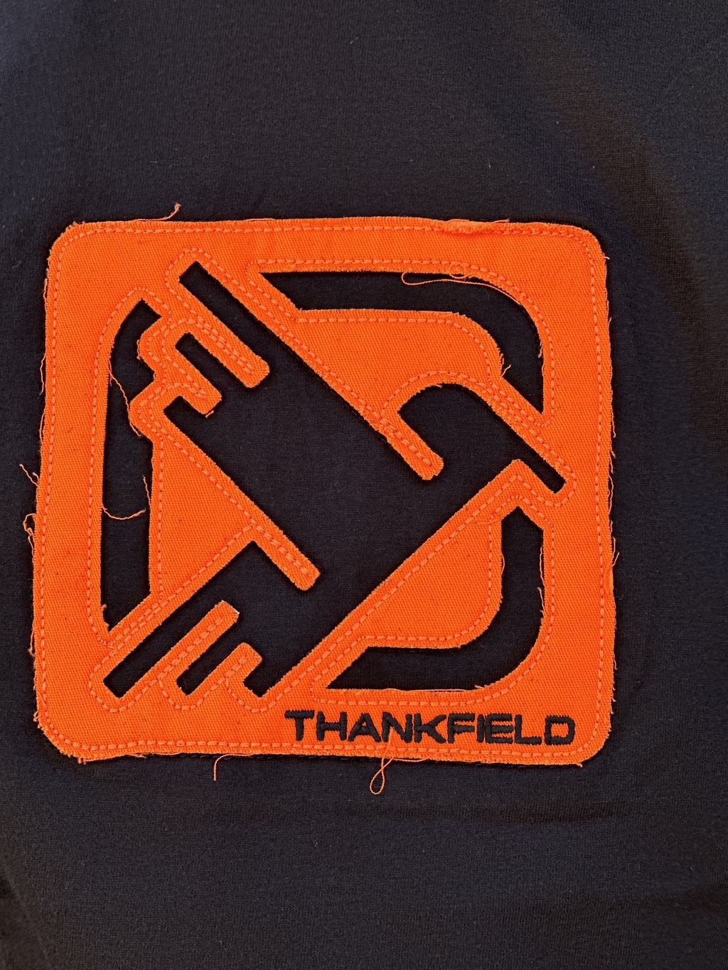 Camiseta Masculina Thankfield Preta Com Logo Laranja 3012