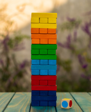 Jenga de colores - Comprar en Jugueteria Caleidoscopio